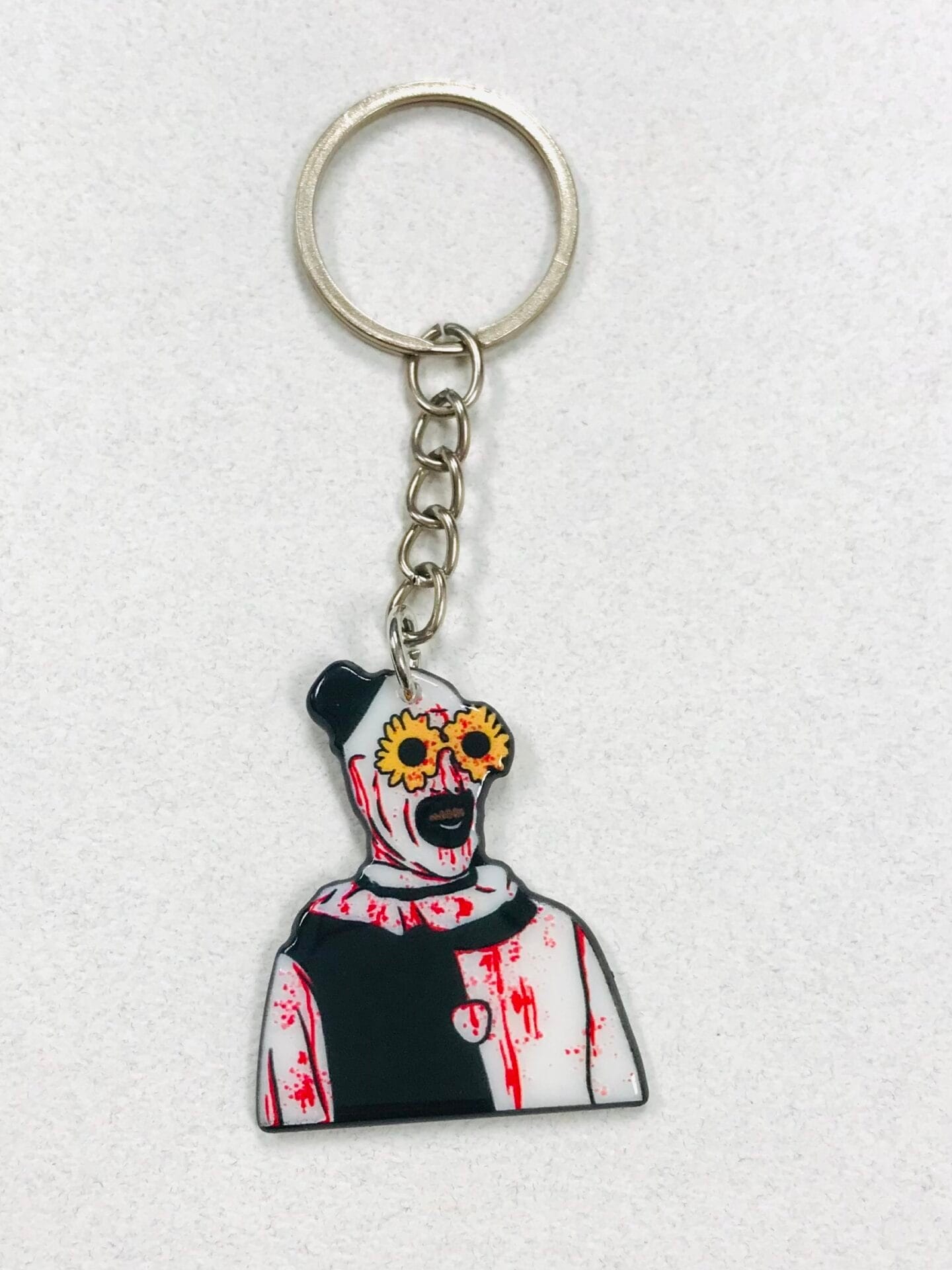 The Terrifier Clown with Sunflower Glasses Keychain - SimpleNGreat ...